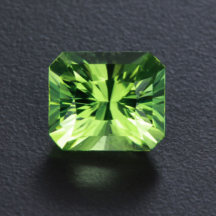 step cut octagon peridot gemstone 8 . 74 carats $ 2400 . 00 $ 4110 . 00